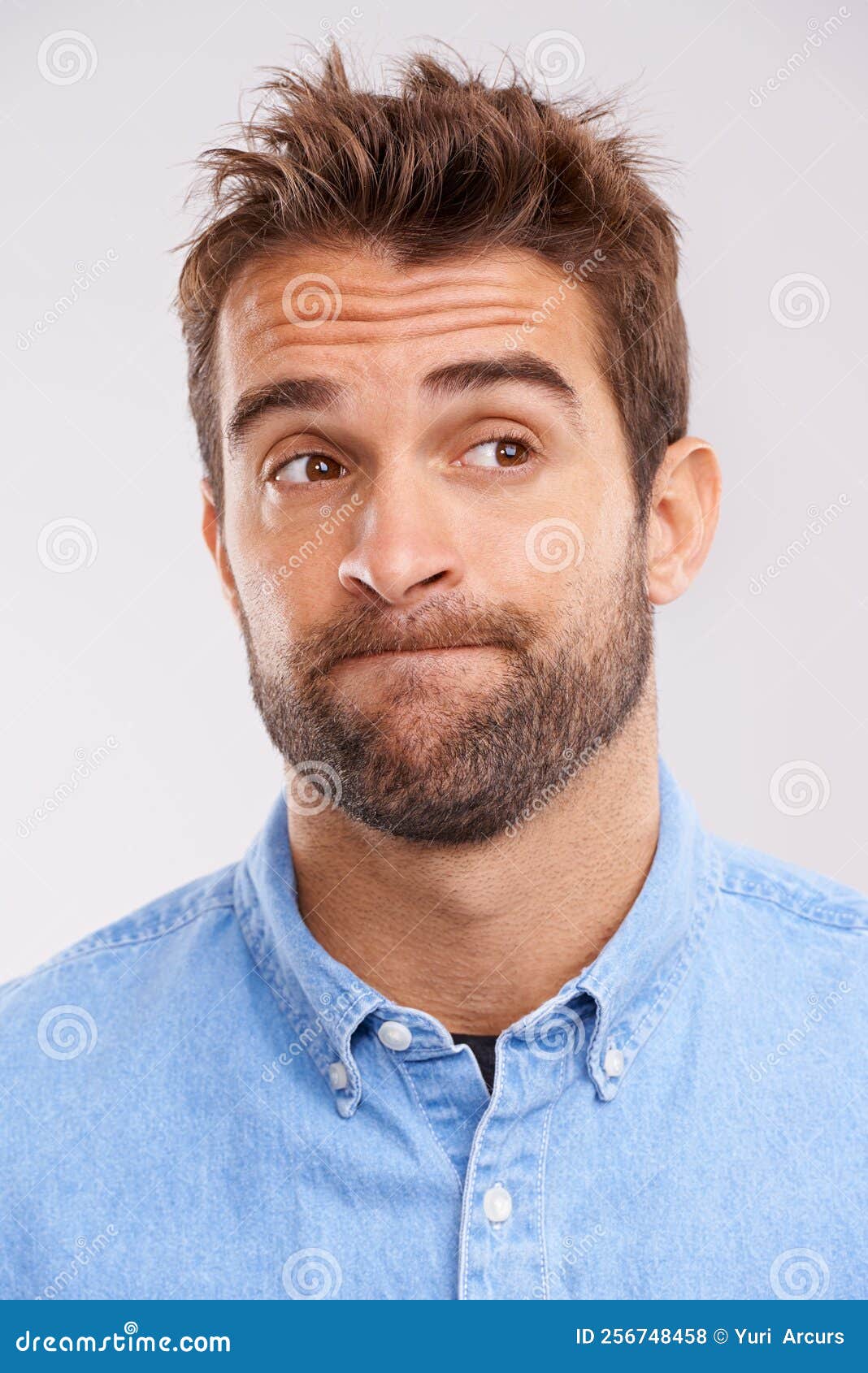 I Dont Know about that. Studio Shot of a Handsome Man Looking Uncertain ...