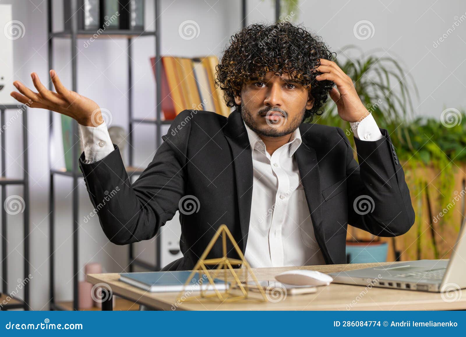 Confused Businessman Embarrassed About Ambiguous Question Having