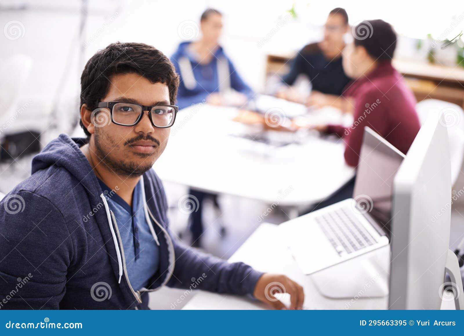 I always Get the Job Done. a Young Man Working on His Laptop in an ...