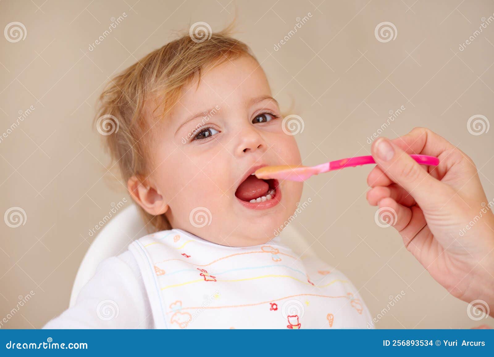 I really Hope this is Good. a Baby Being Spoon Fed at Home. Stock Photo ...