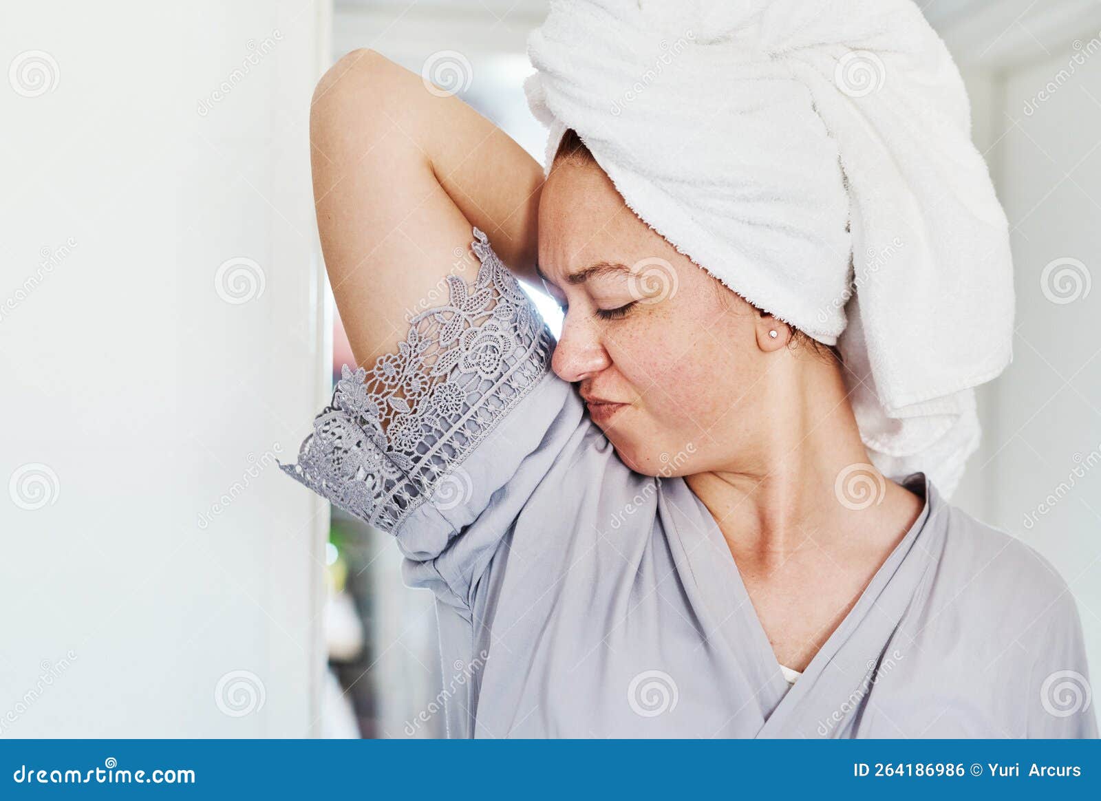 But I Just Got Out Of The Shower A Young Woman Smelling Her Armpits