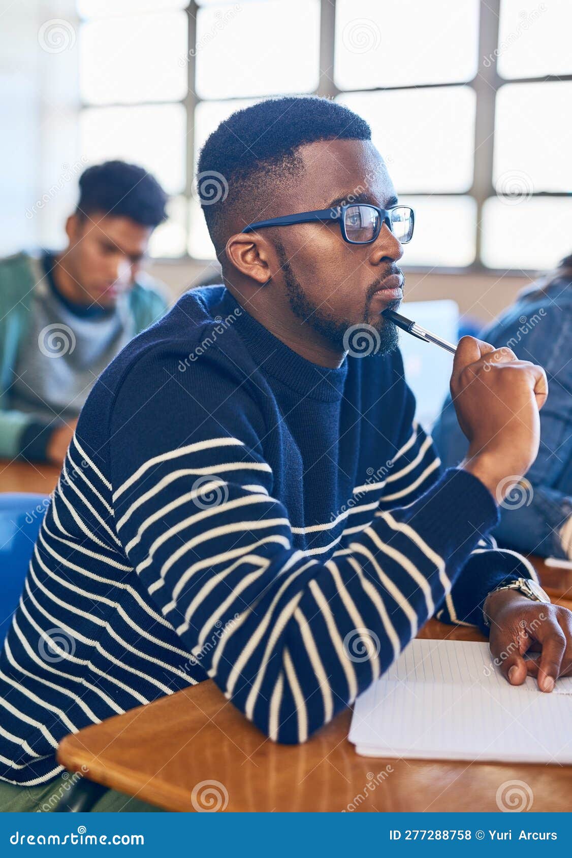 I Know the Answer To this...a University Student Sitting in Class ...