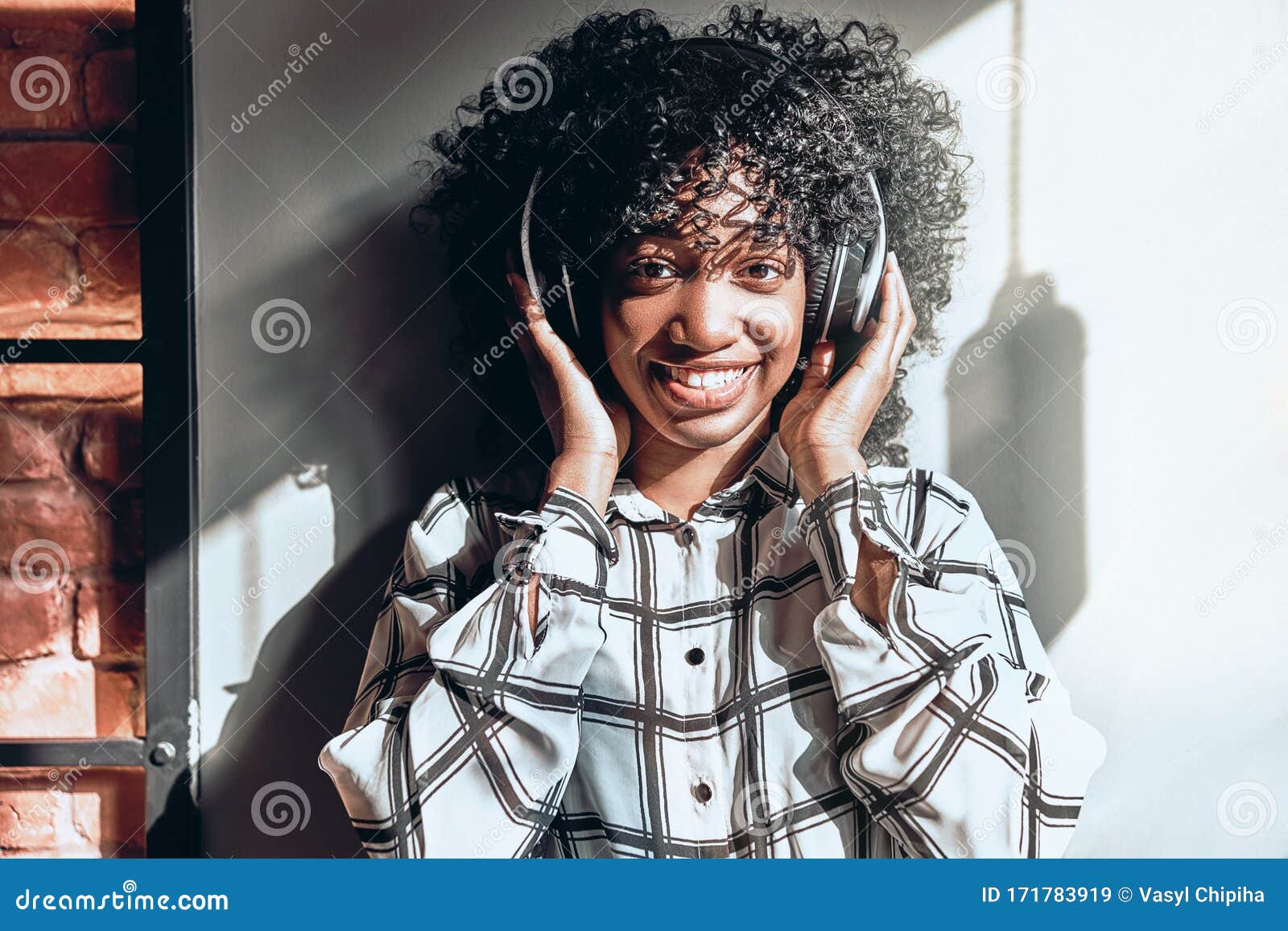 I Like Music A Beautiful African American Woman Holds Headphones And