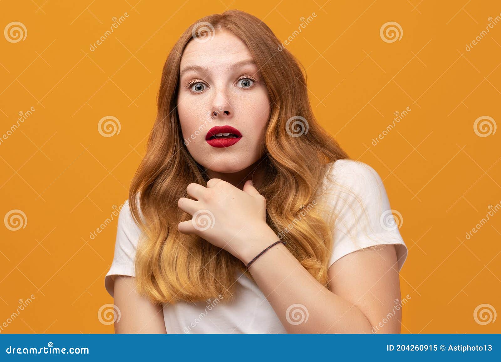 Portrait of the Scared Girl with Wavy Redhead, Wearing White T-shirt ... Portrait of the Scared Girl with Wavy Redhead, Wearing White T-shirt ...