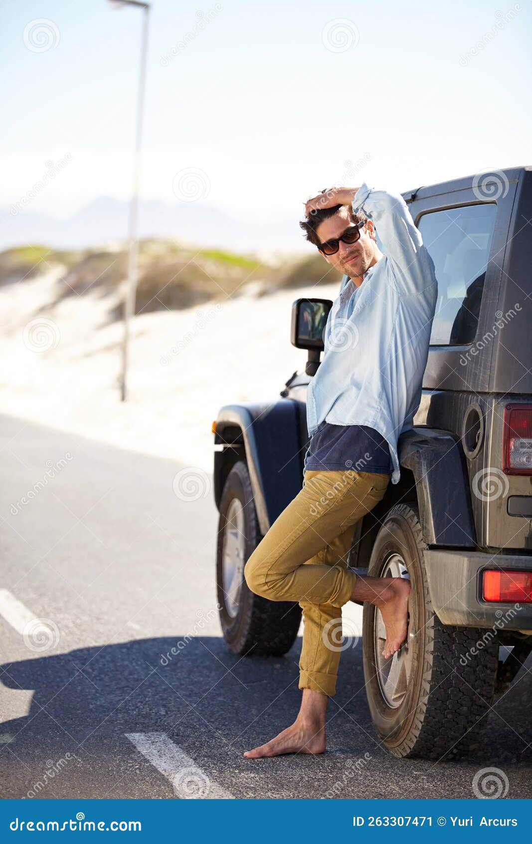 I Need a Little Help Out Here. a Young Man Waiting for Roadside ...