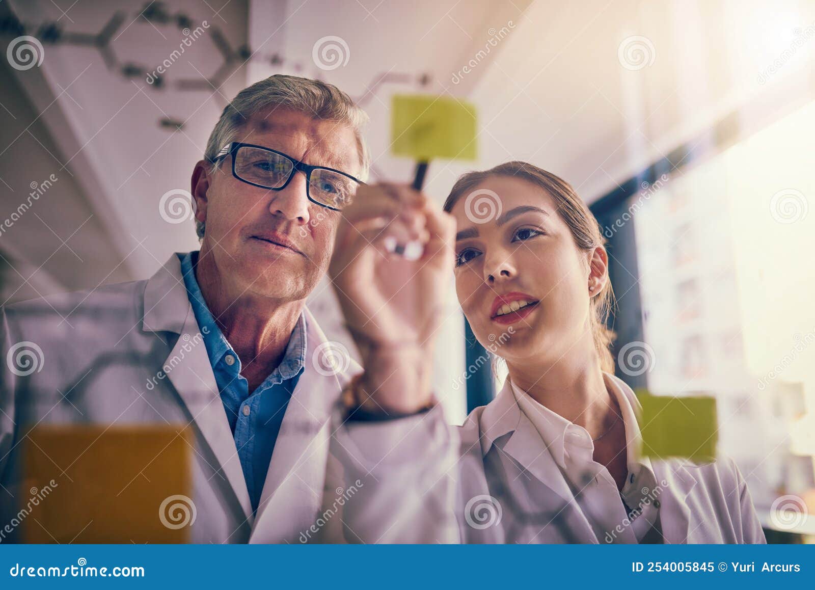 I Think Were Going Somewhere Here. Two Focused Scientists Working ...