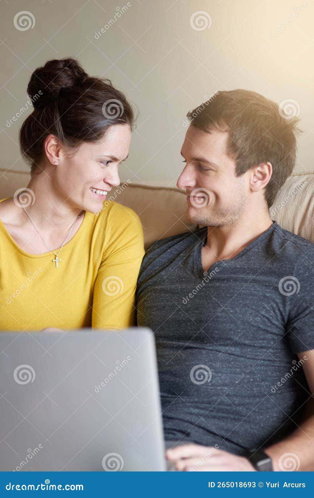 I Think Weve Got A Connection A Loving Couple Using A Laptop Together At Home Stock Image