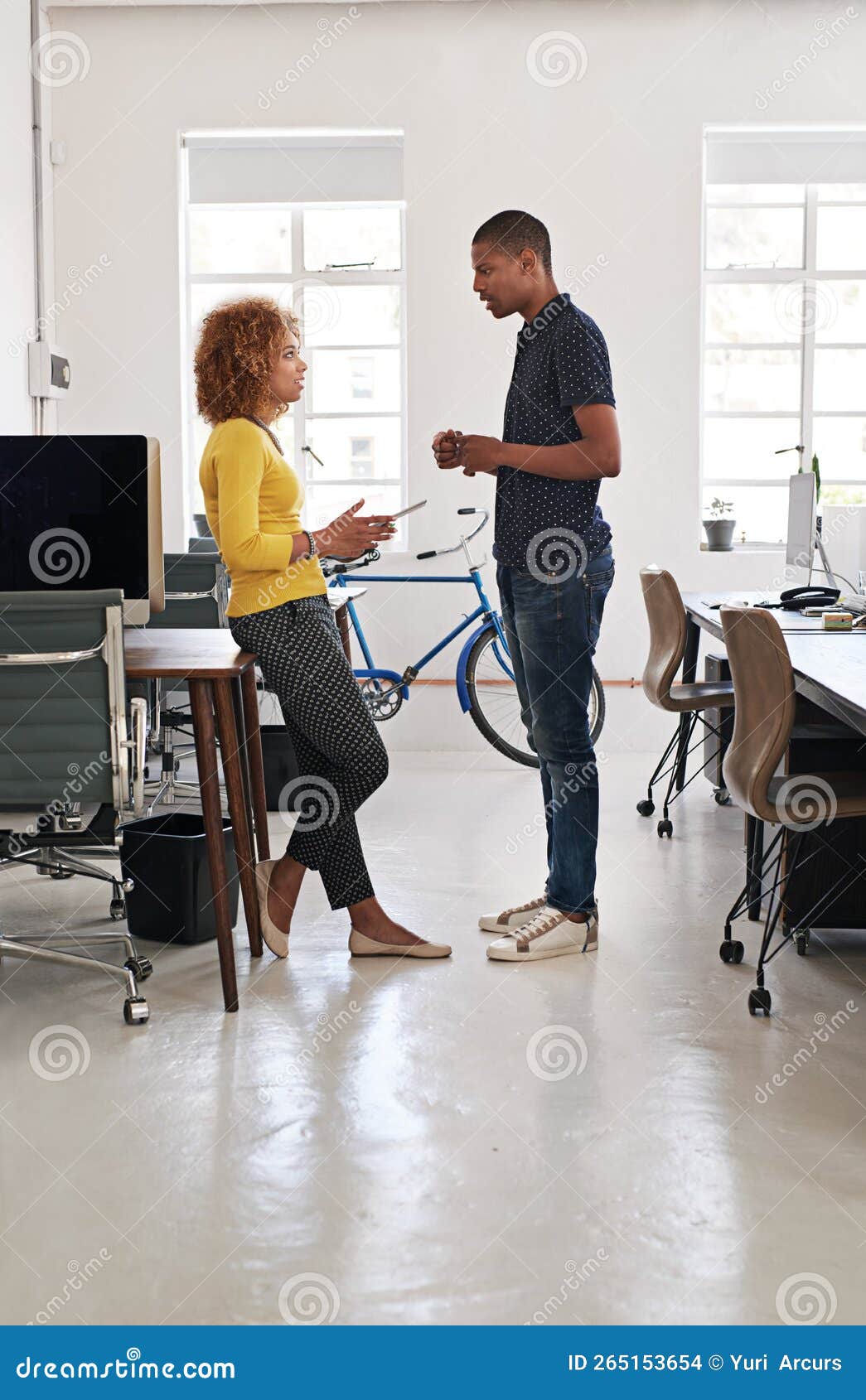 I Value Your Input. Two Colleagues Having a Discussion in a Modern ...