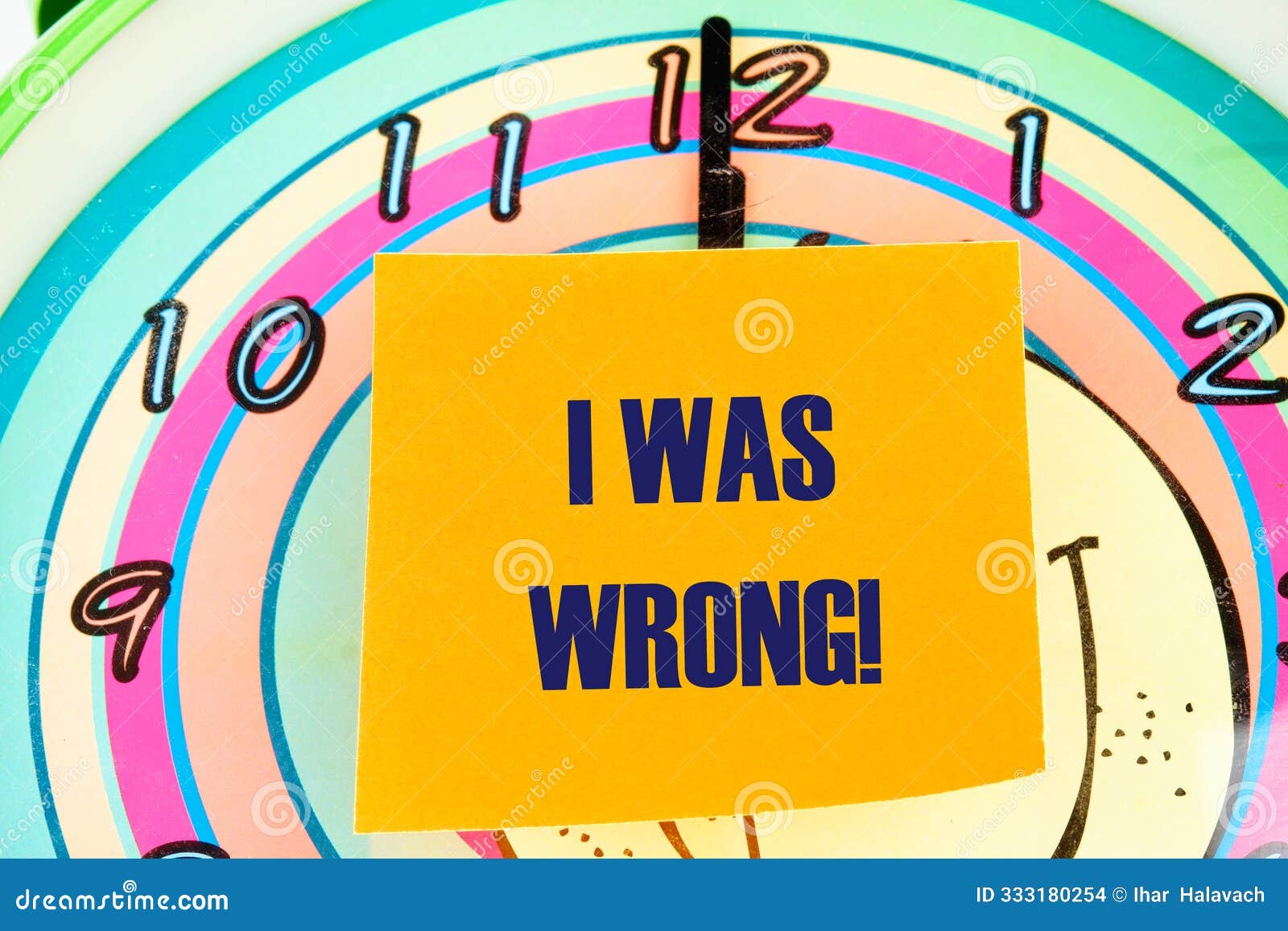 I WAS WRONG Text Written on the Sticker on the Background of the Clock ...