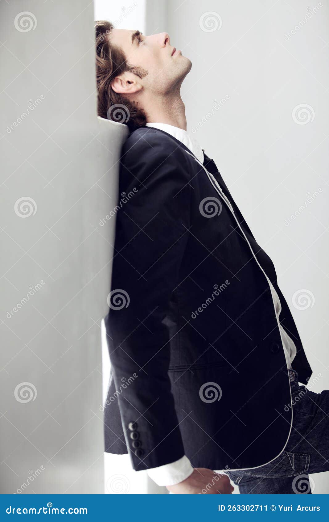 I Wonder What I Can Expect. a Young Man Looking Upward and Thinking ...