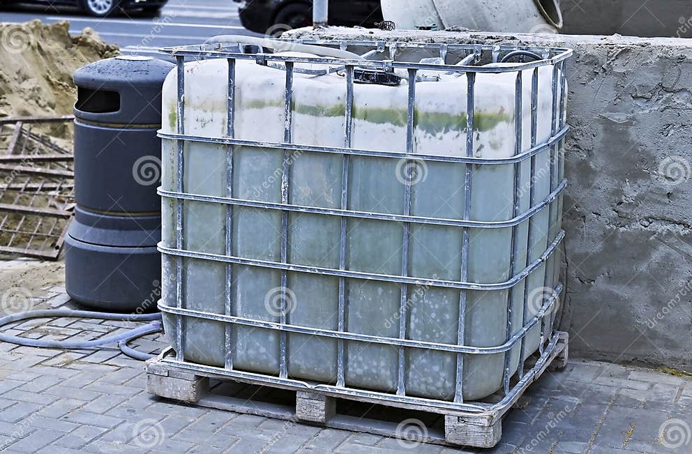 IBC container for liquid stock image. Image of canal - 318806469