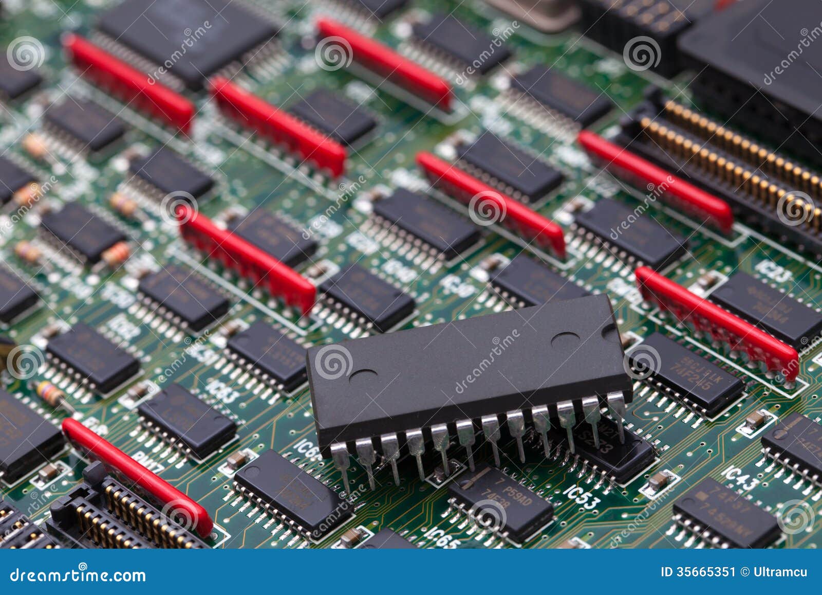 The IC on green circuit stock image. Image of electronic - 35665351