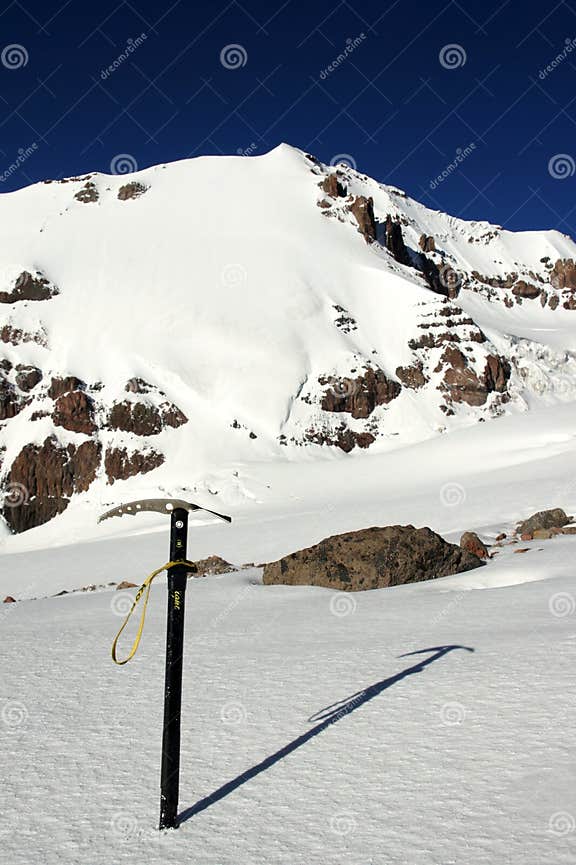 Ice-axe in snow. stock photo. Image of altitude, reflection - 19937452