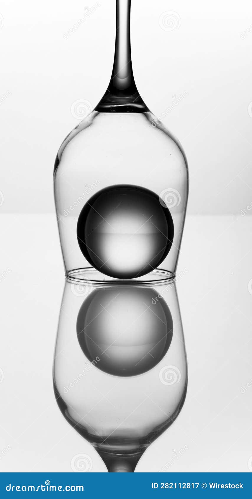 Ice Ball Inside a Wine Glass with Reflection Stock Image - Image of ...