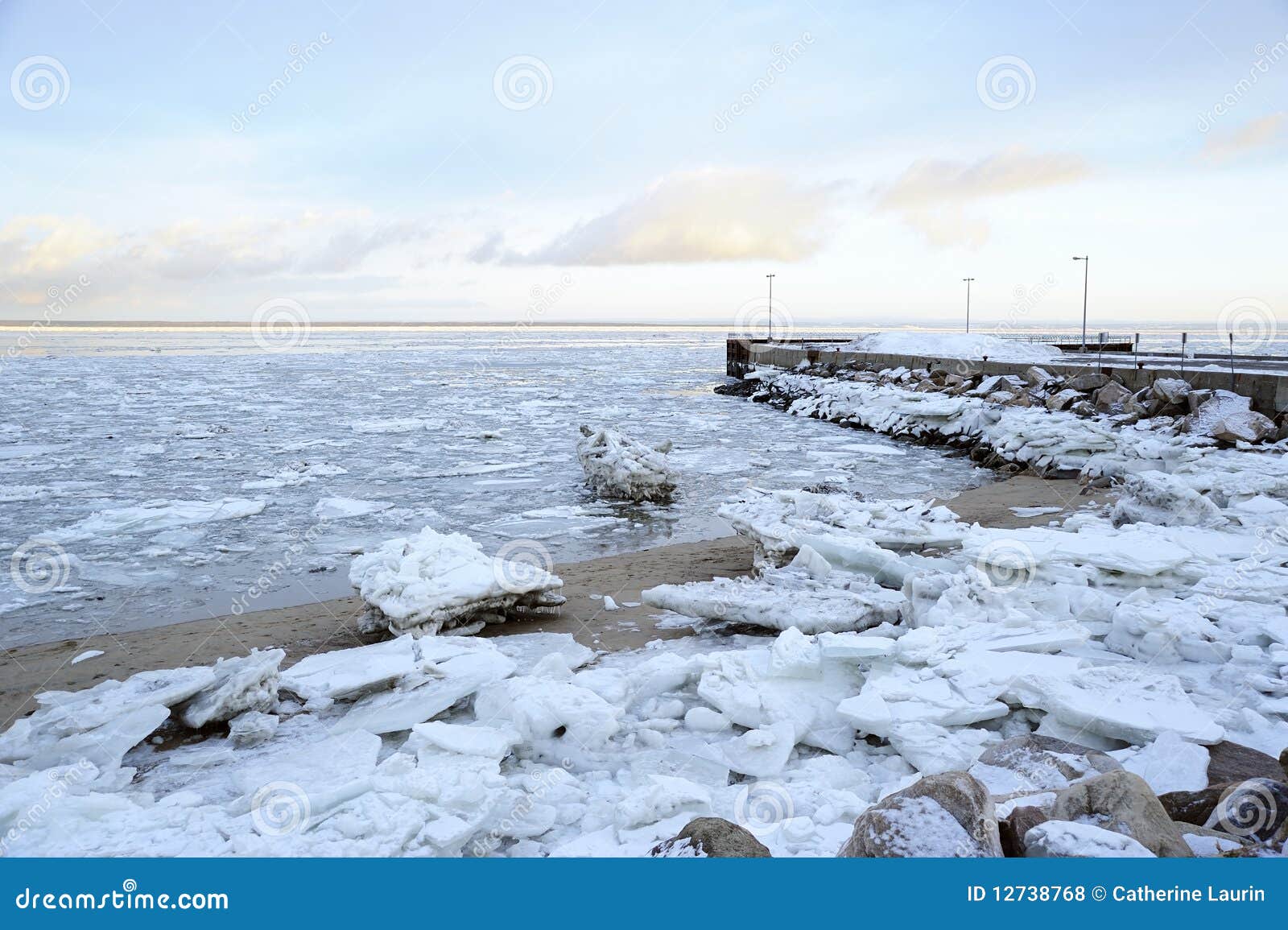 Ice on the beach and quay stock photo. Image of nature - 12738768