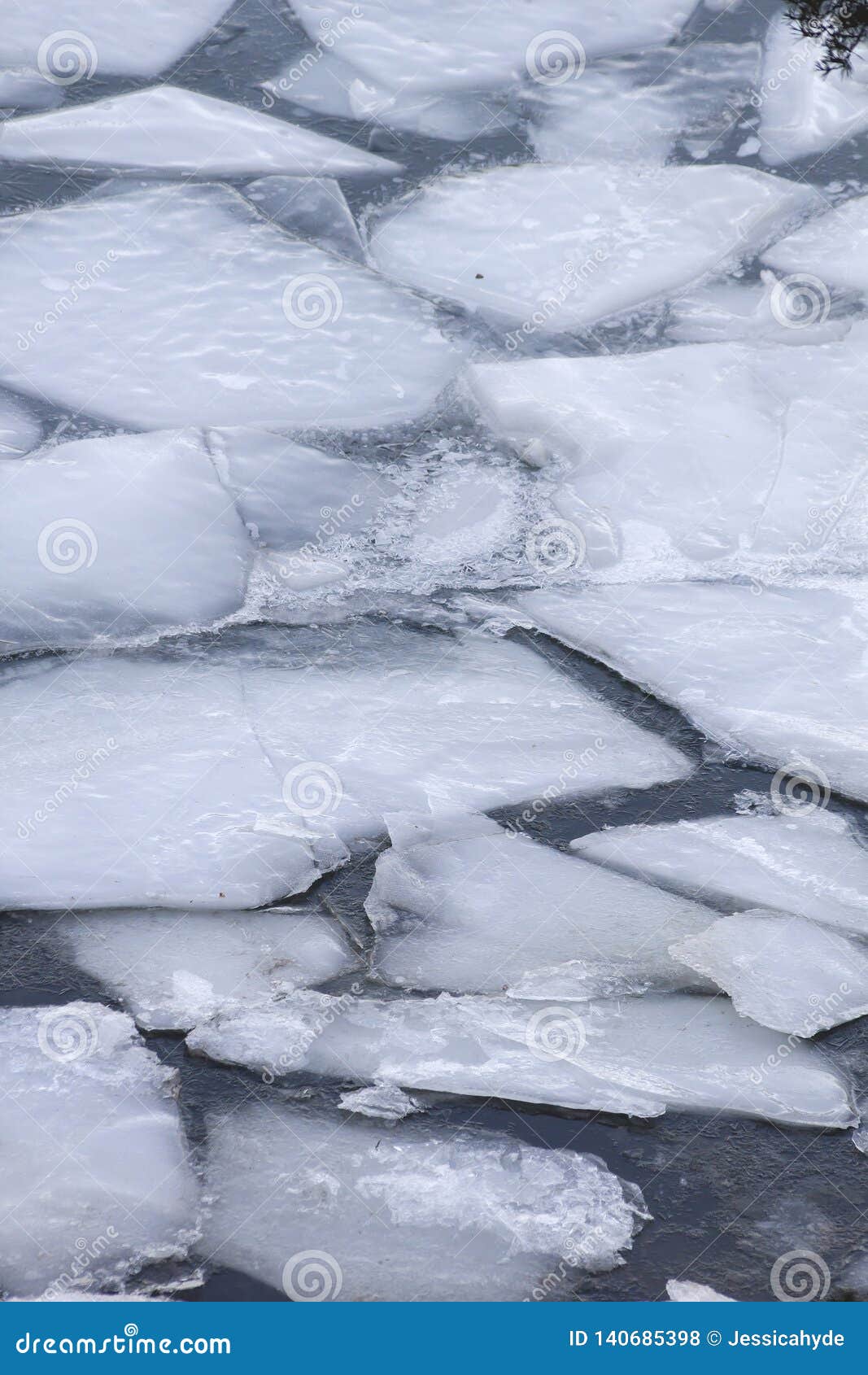 Ice blocks on lake surface stock photo. Image of river - 140685398