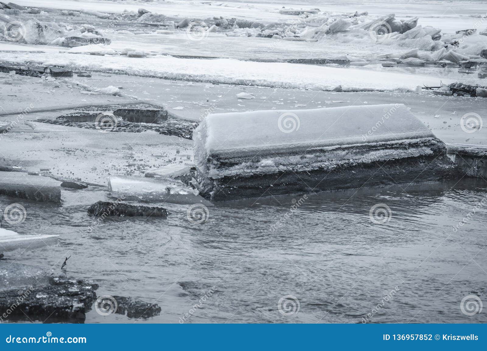Ice breaking on the lake stock photo. Image of golden - 136957852