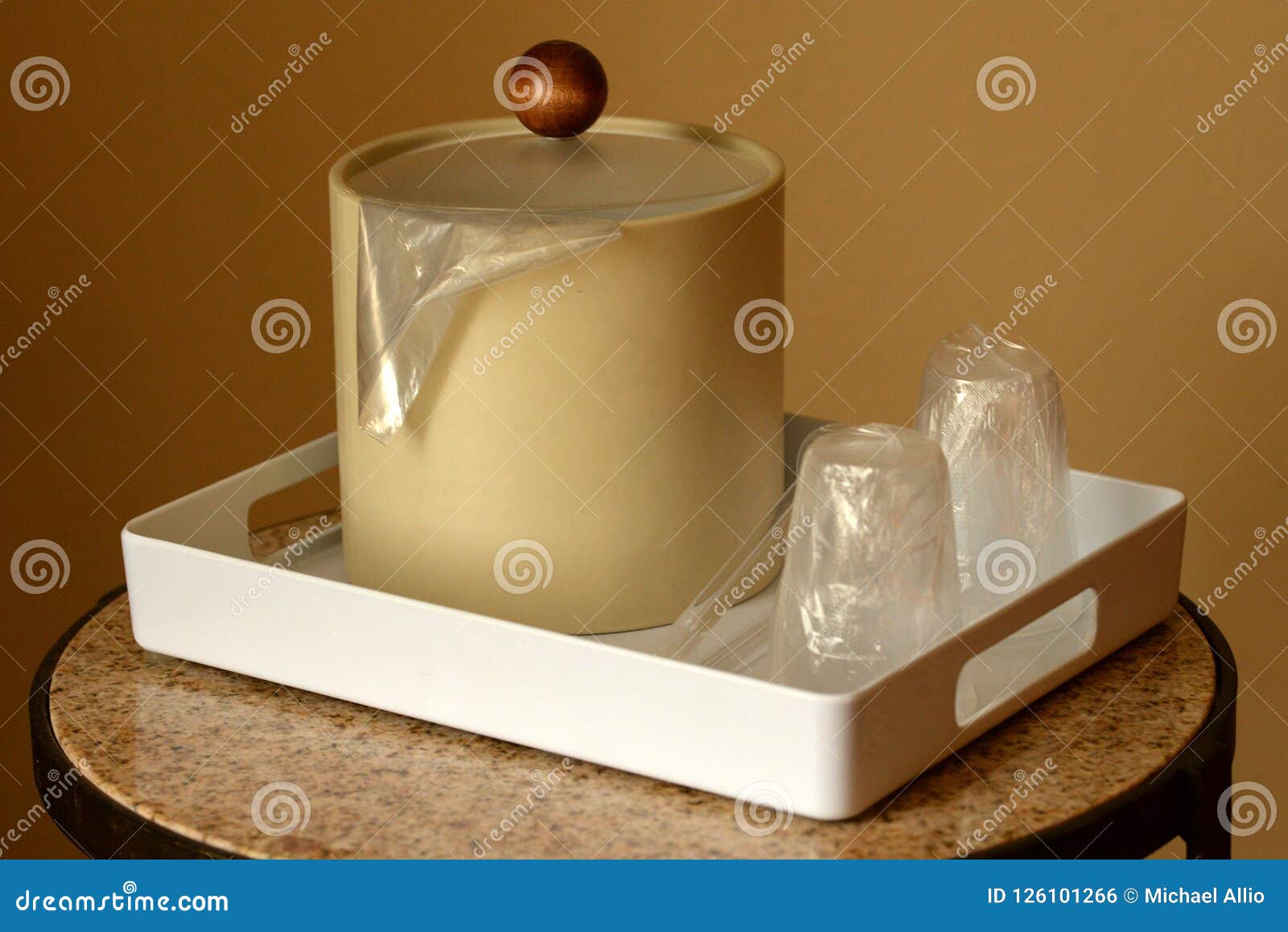 Ice bucket on a table stock photo. Image of room, container - 126101266