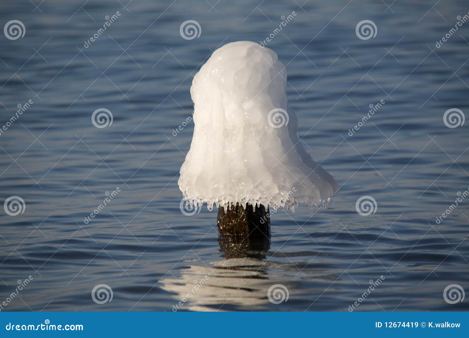 Ice capped pylon in water stock image. Image of coastal - 12674419