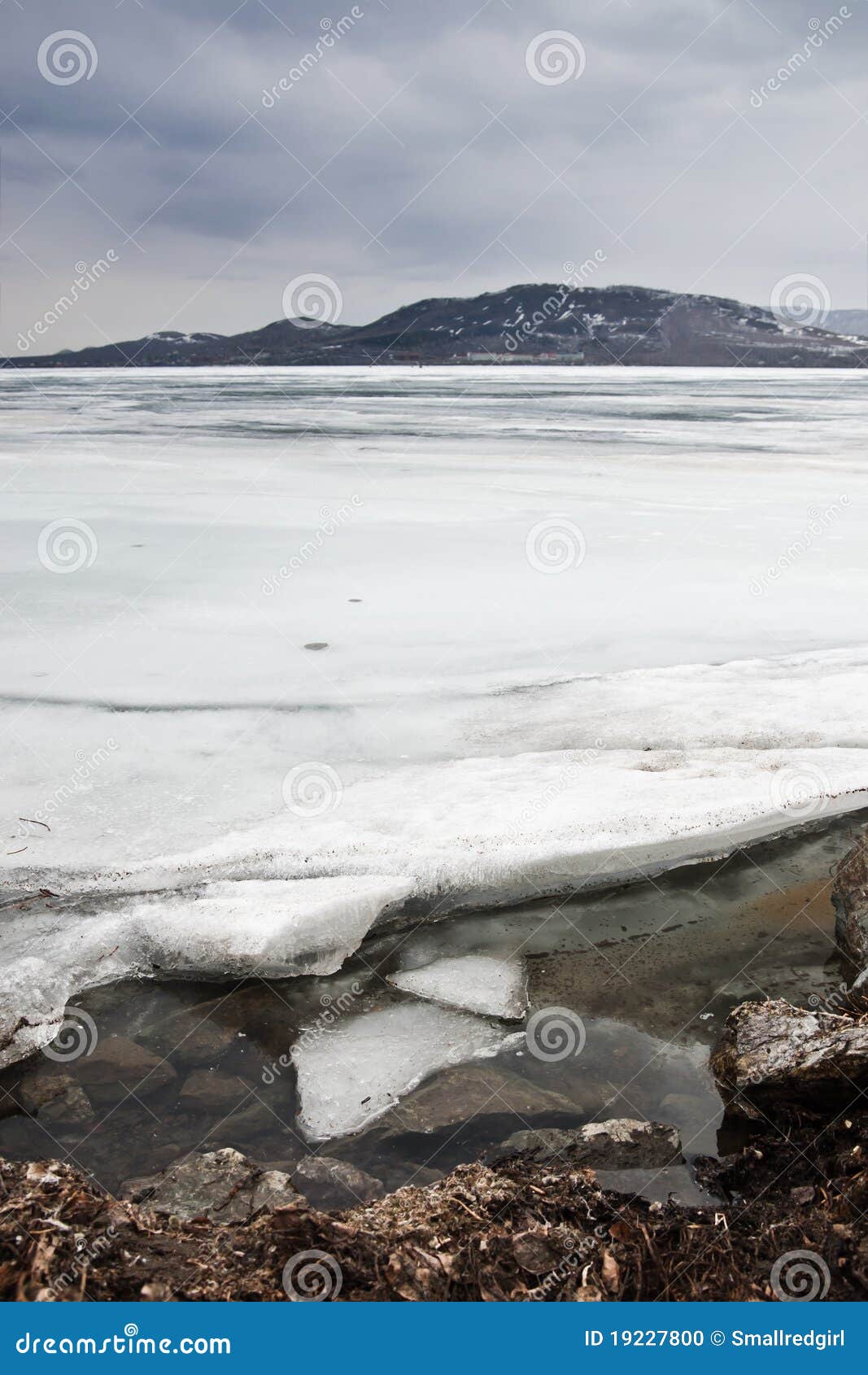 Ice on the coast of lake stock photo. Image of horizon - 19227800