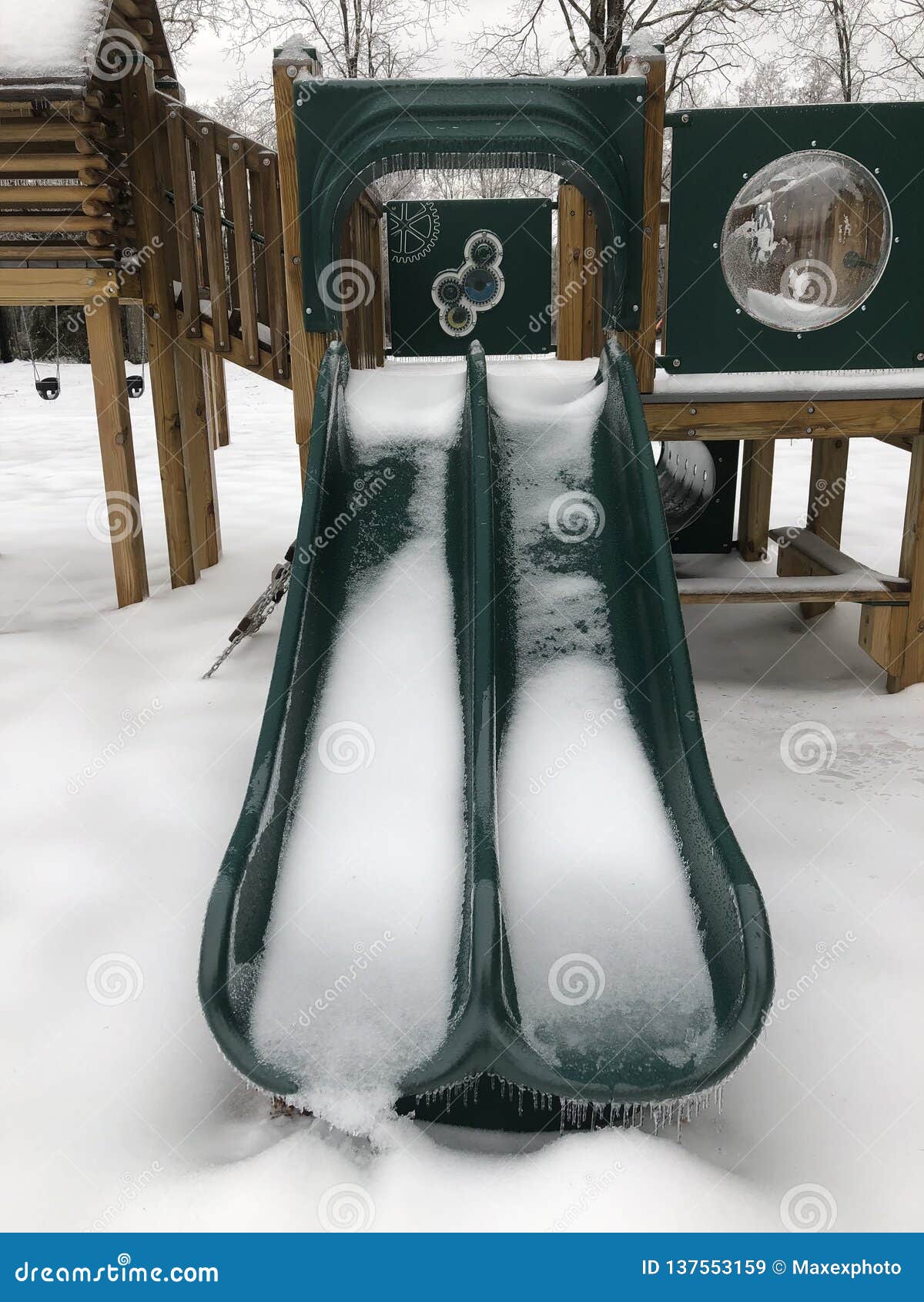 Ice coated sliding board stock image. Image of jungle - 137553159