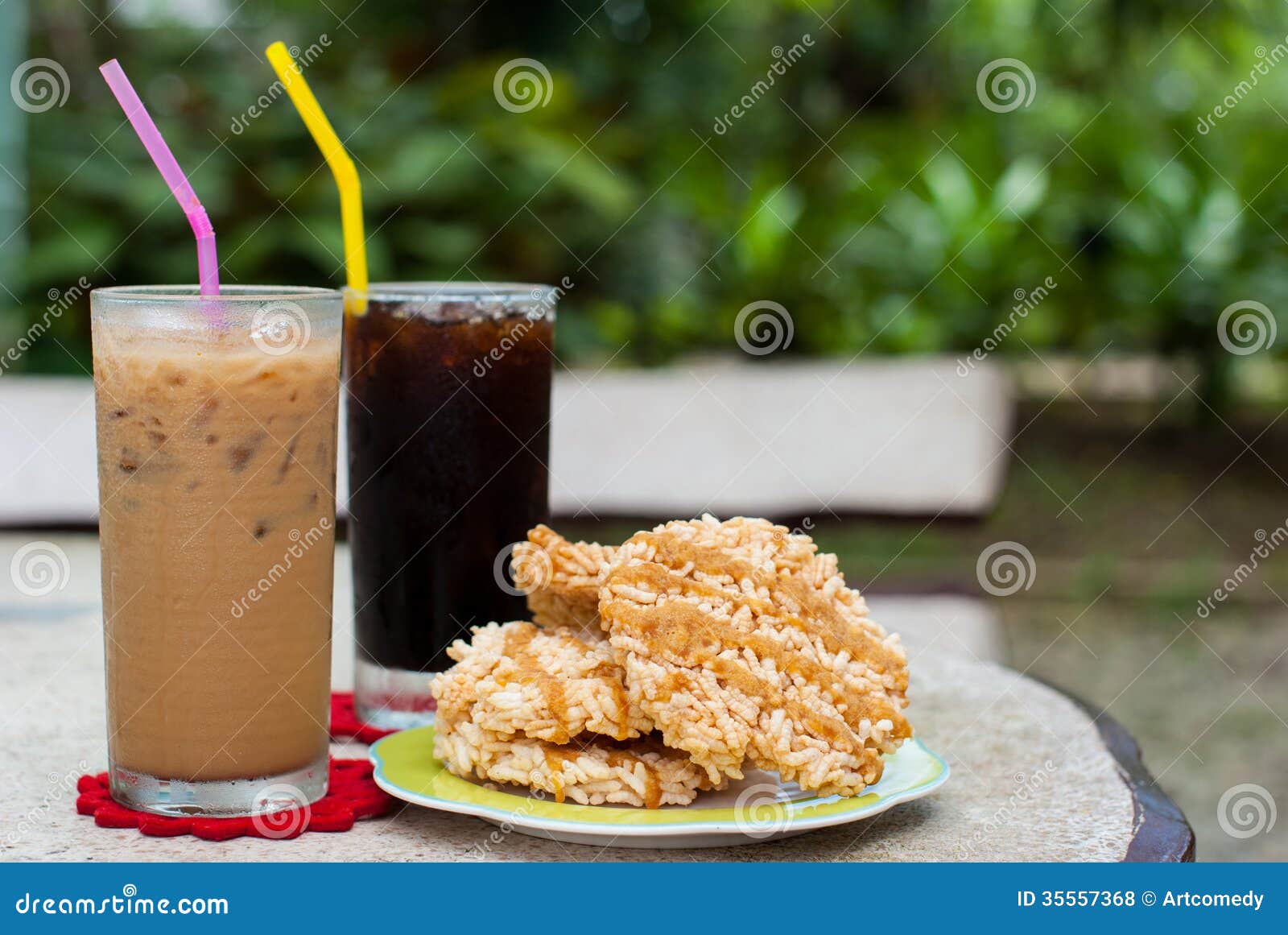 Ice Coffee and Americano with Rice Cracker (Khao Tan) Stock Photo ...