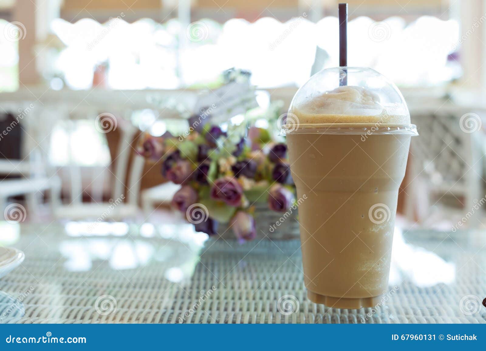 Coffee-frappe With Ice And A Straw In An Unusual Glass Jug. Morning ...