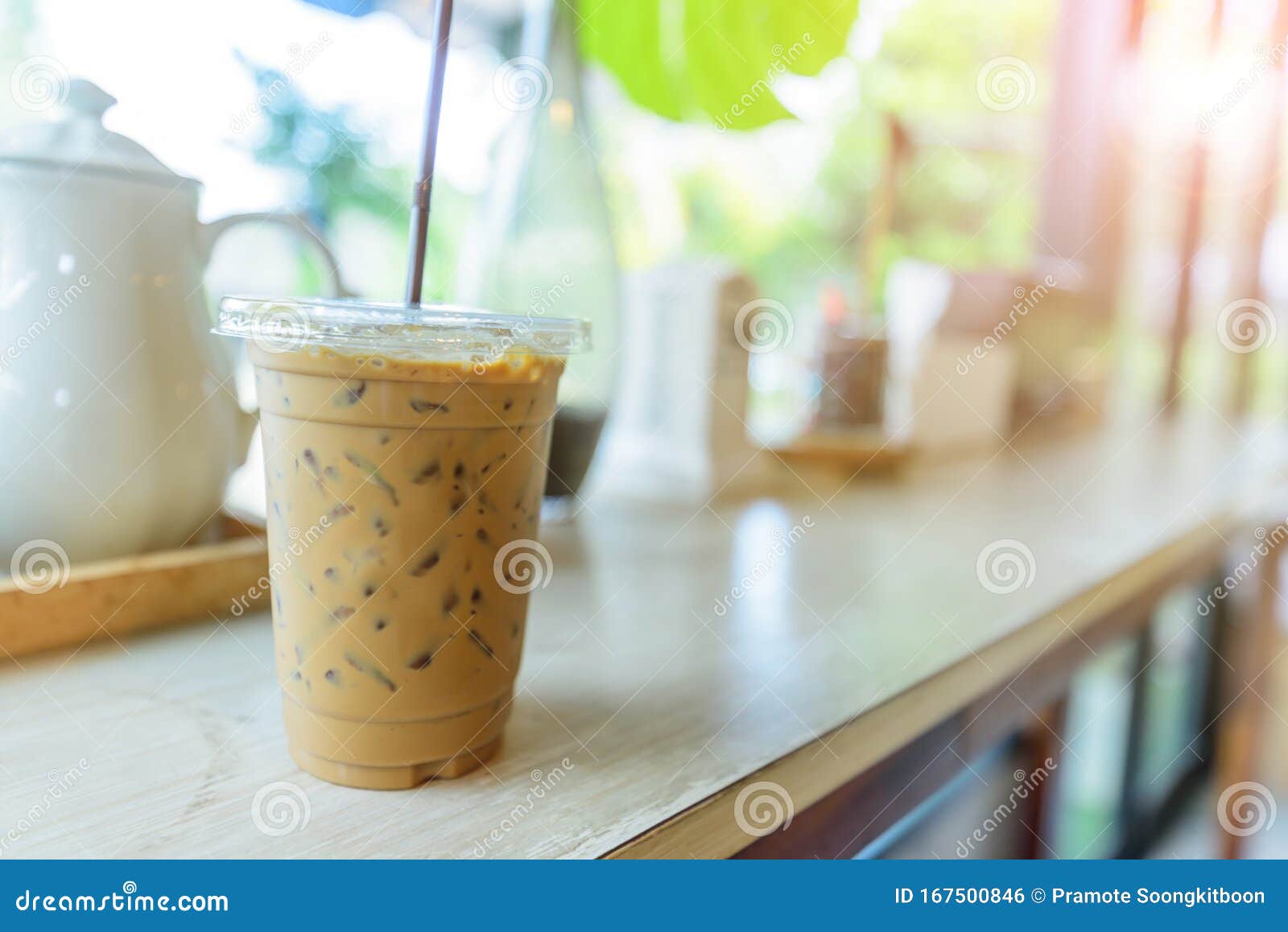 Ice coffee on the table stock photo. Image of table - 167500846