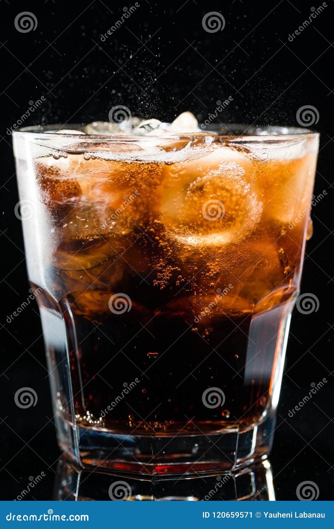 Ice Cola with Splashing CO Bubbles in a Glass Stock Image - Image of ...