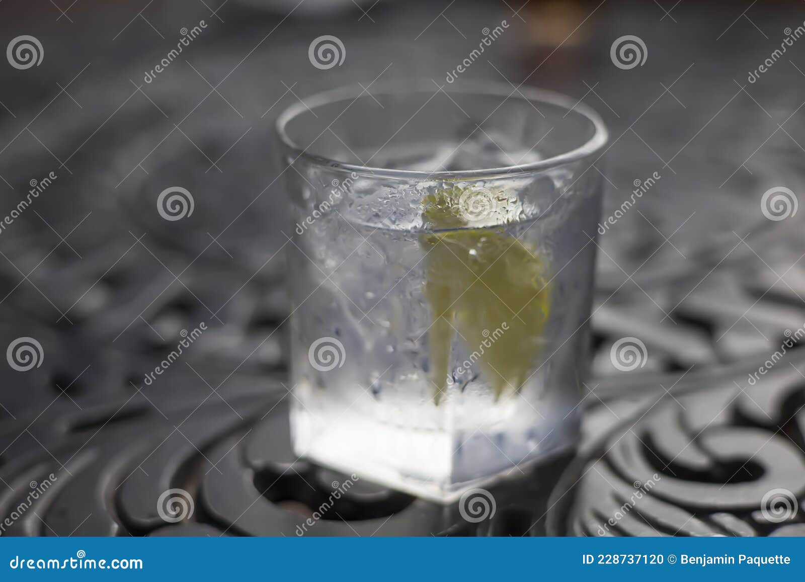 Ice Cold Gin and Tonic in a Glass on a Table Stock Photo - Image of ...