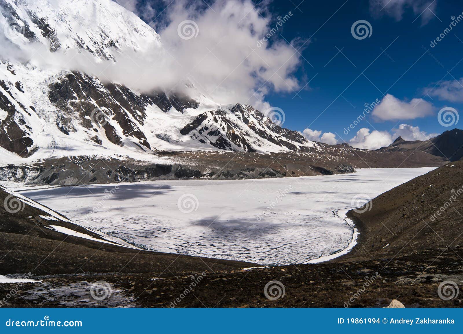 Ice-covered Mountains Lake with the Clouds Shadows Stock Photo - Image ...
