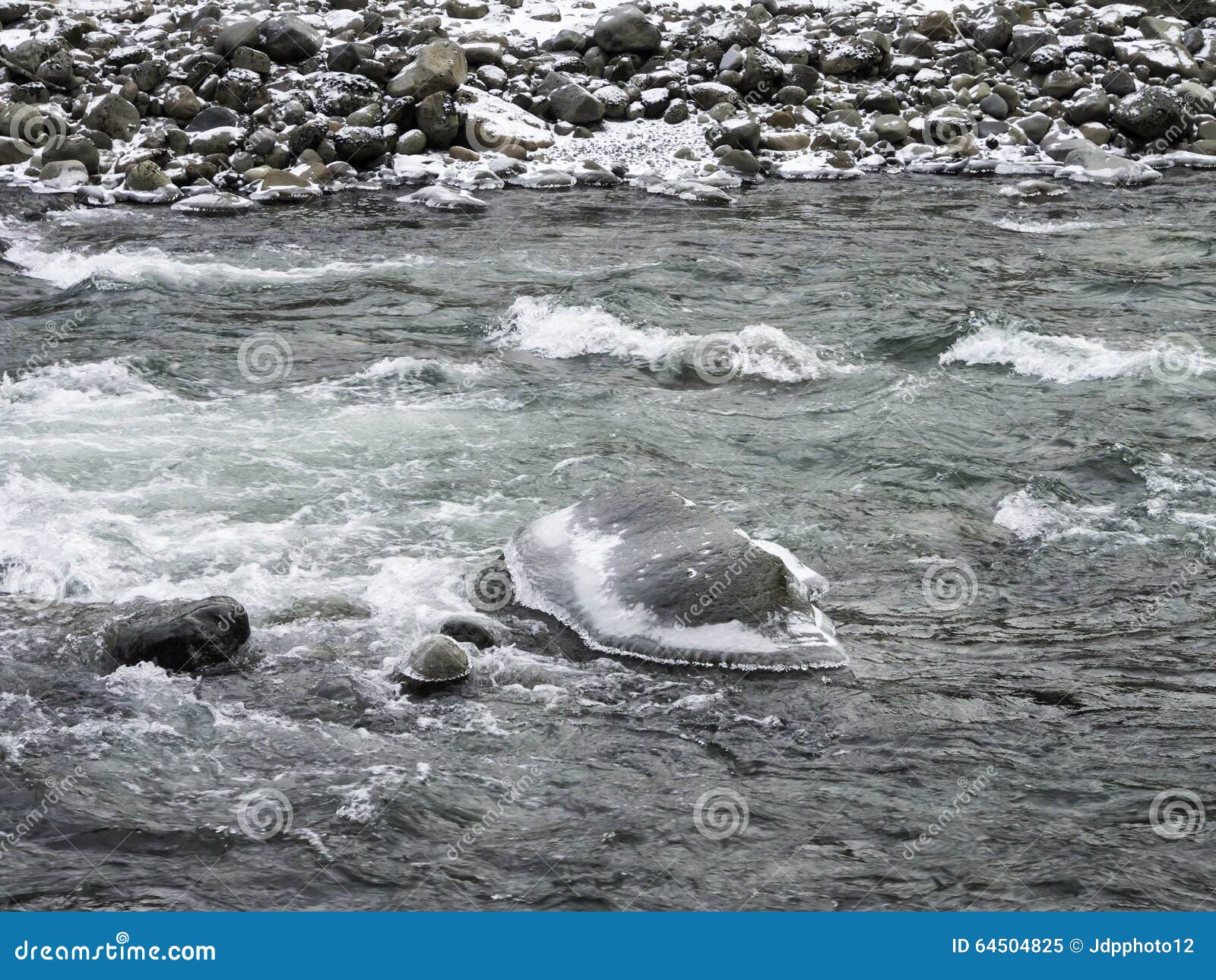 Ice Covered Rocks in Sandy River with Mushroom Ice Caps Stock Image ...