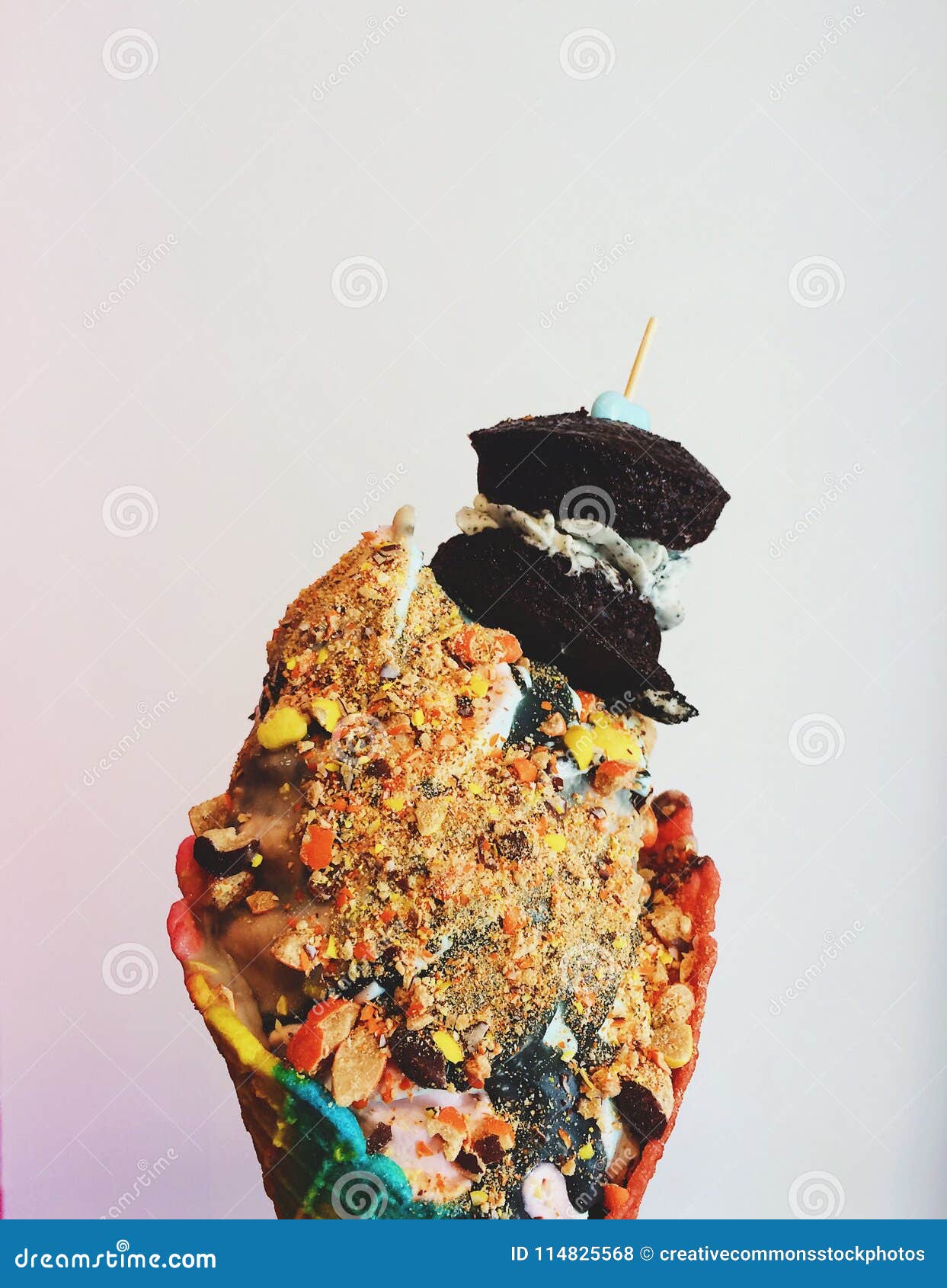 Ice Cream On Cone With Crushed Peanuts And Brownies Picture. Image ...