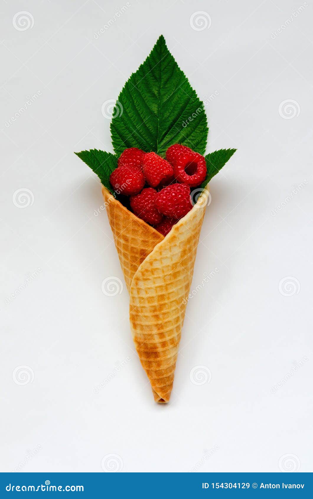 The Ice Cream Cone Filled with Raspberry on a White Background Stock ...