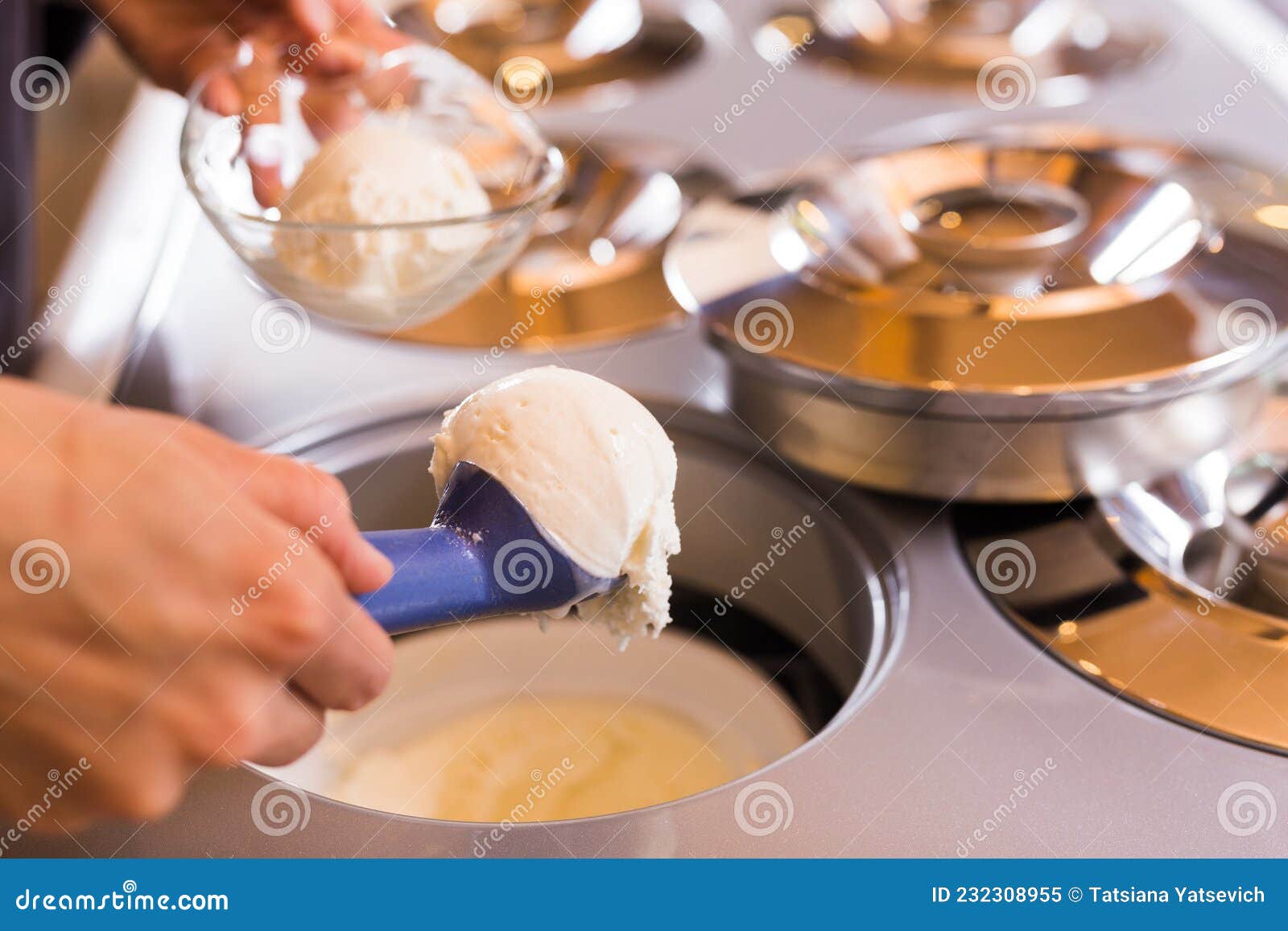 Ice Cream Razor with Ice Cream Ball in Background of Refrigerated ...