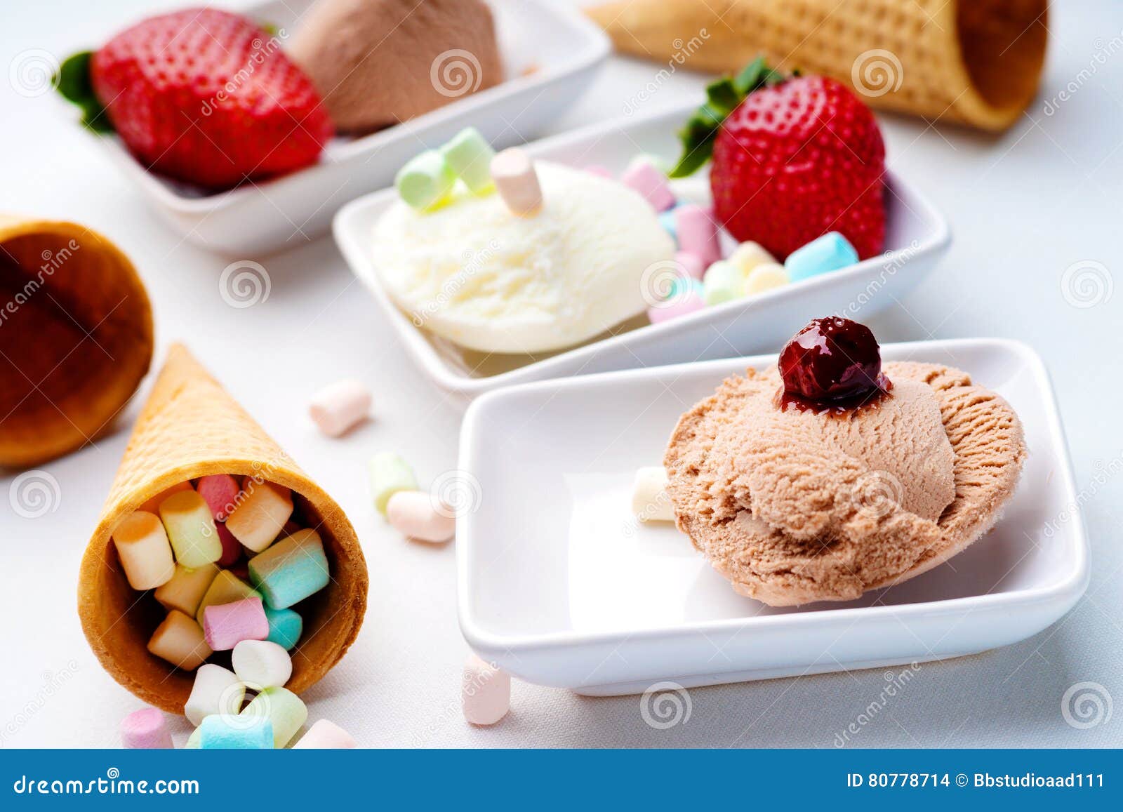Ice Cream Sundae, Waffle Cone, Strawberry and Candies Stock Photo ...