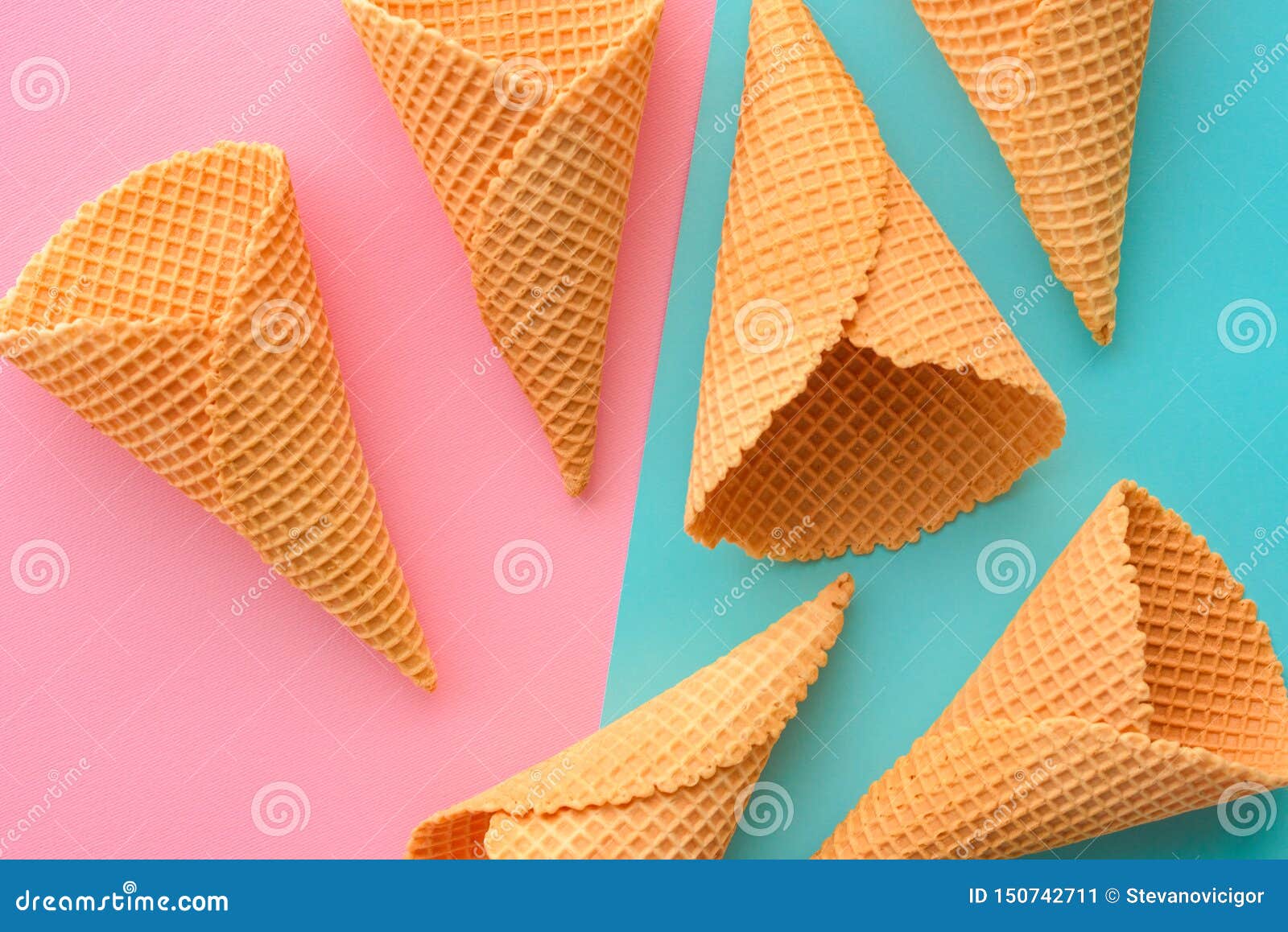 Ice Cream Waffle Cones On Pastel Pink And Blue Background Stock Image
