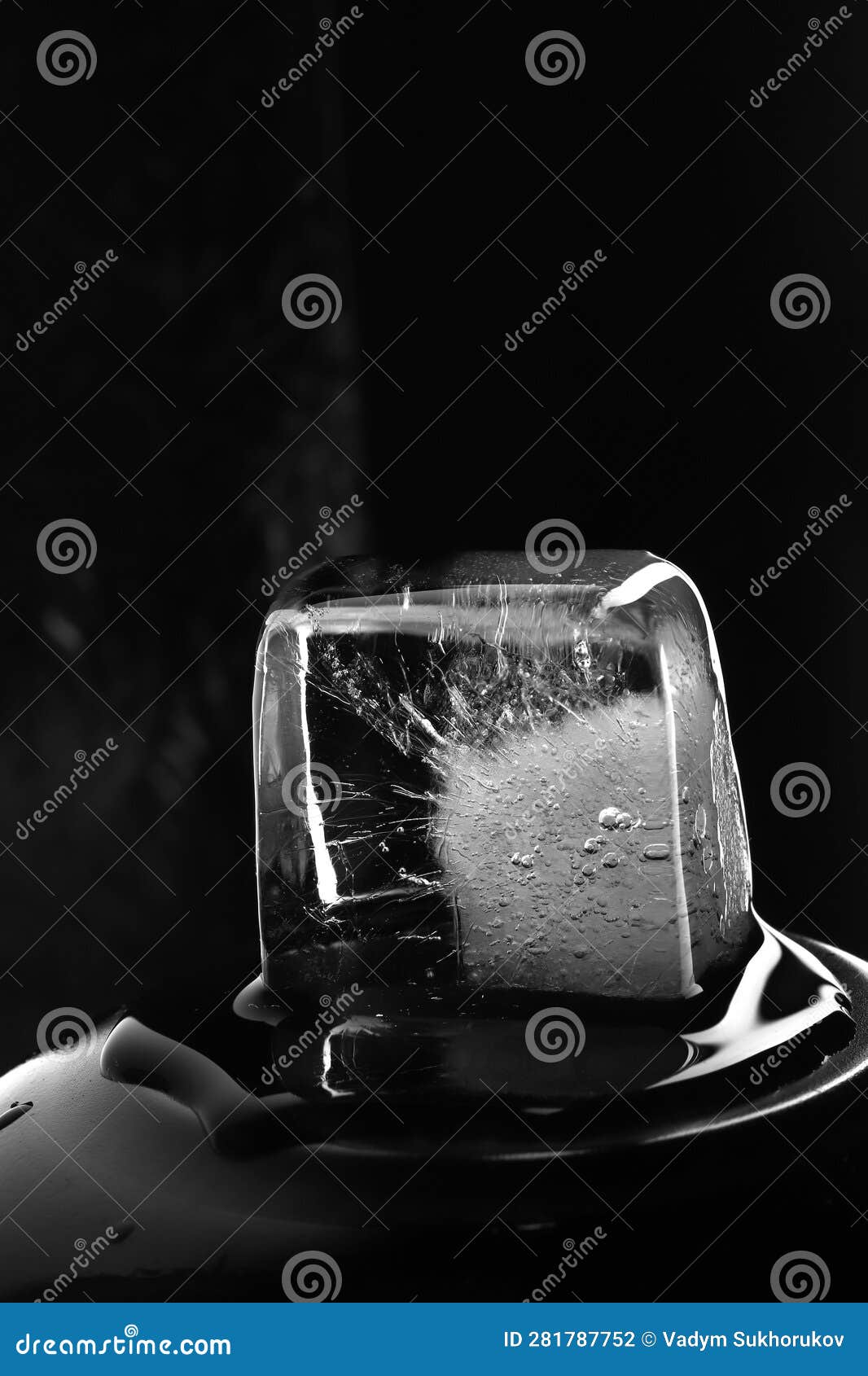 Ice Cube on Black Background. Low Key Photo Stock Photo - Image of ...