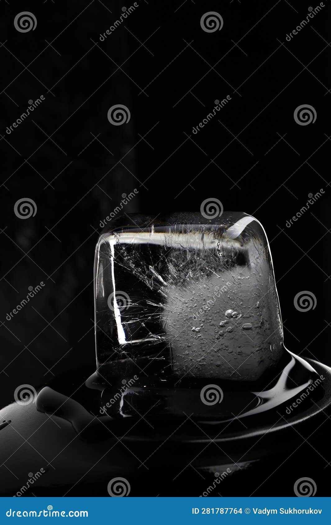 Ice Cube on Black Background. Low Key Photo Stock Photo - Image of ...
