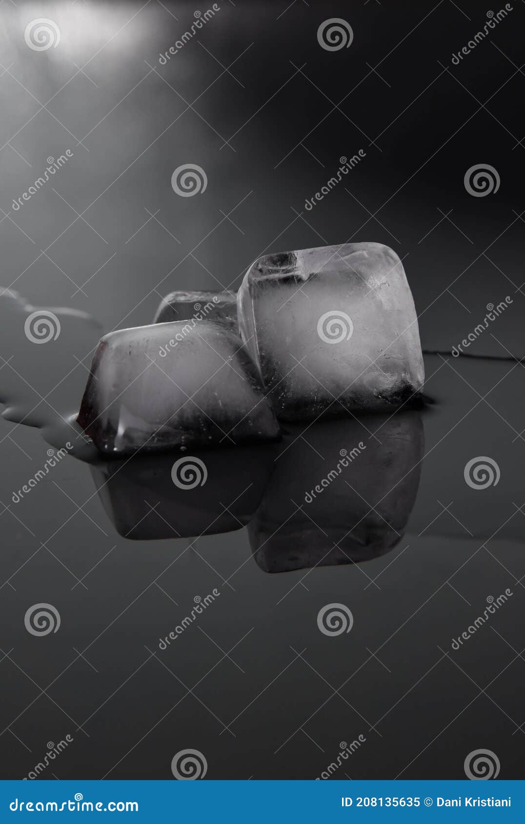 Ice Cube Melt on Grey Background Stock Image - Image of dark ...