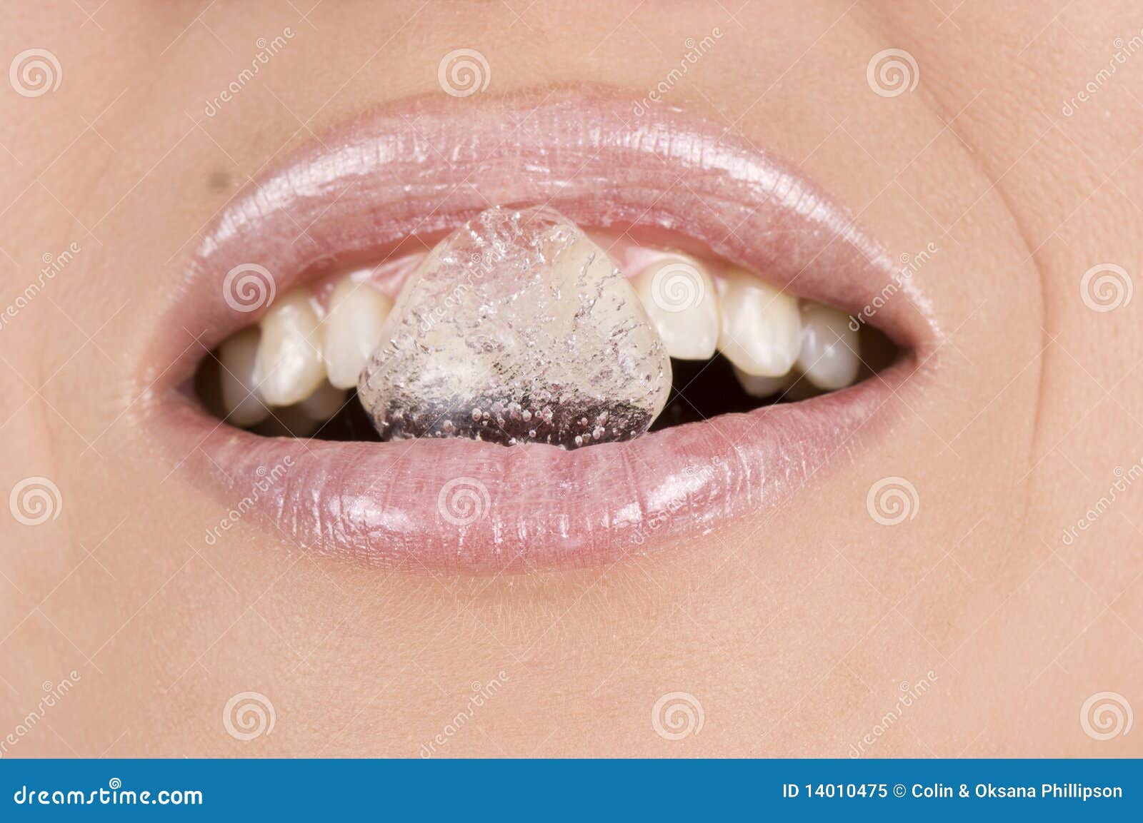 Ice cube in the mouth stock image. Image of juicy, light - 14010475