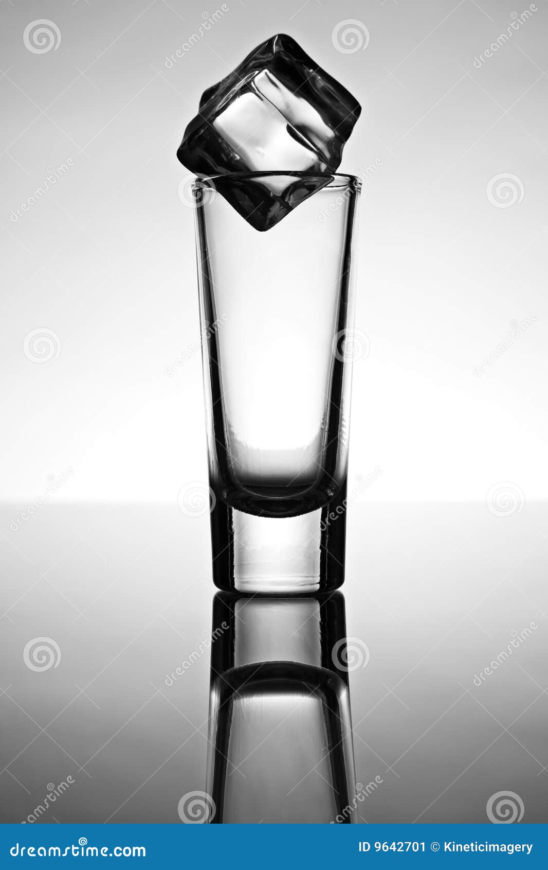 Ice cube and shot glass stock image. Image of shot, beverage - 9642701