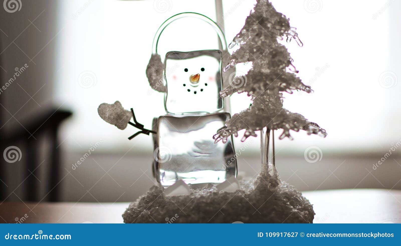Ice Cube Snowman With Headphones Ornament Picture. Image: 109917627