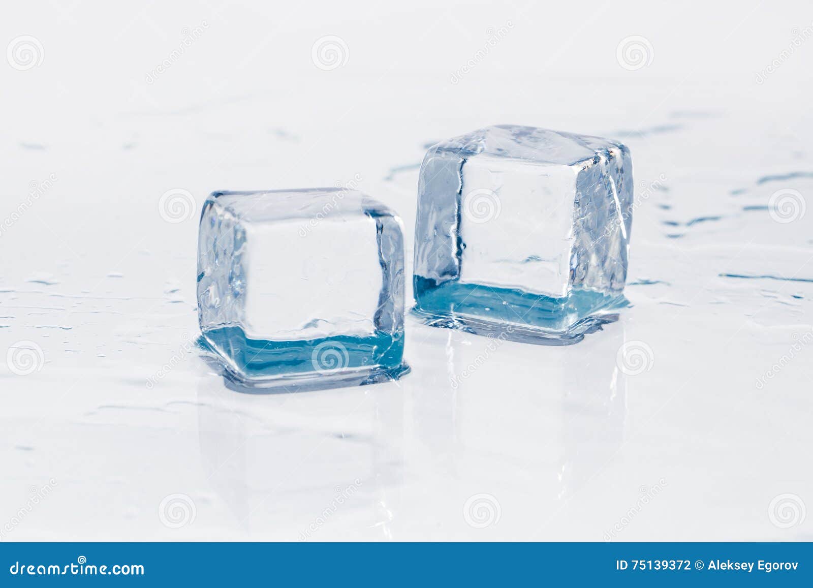 Ice cube on table stock photo. Image of cold, horizontal - 75139372