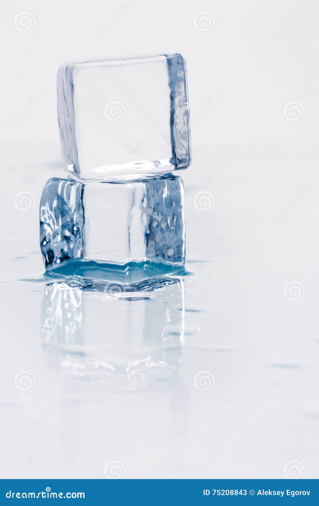Ice cube on table stock image. Image of frost, light - 75208843