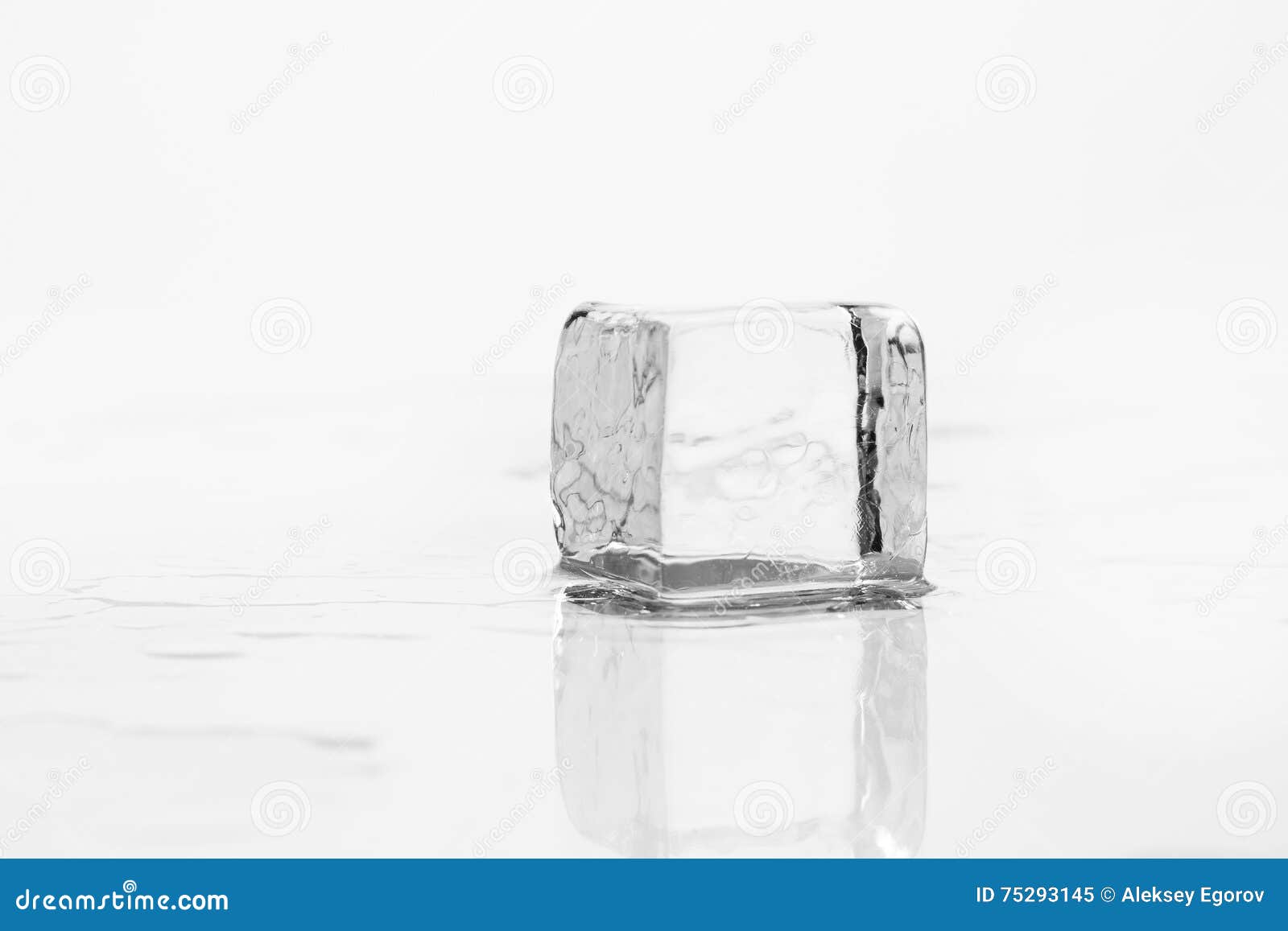 Ice cube on table stock image. Image of frozen, reflection - 75293145