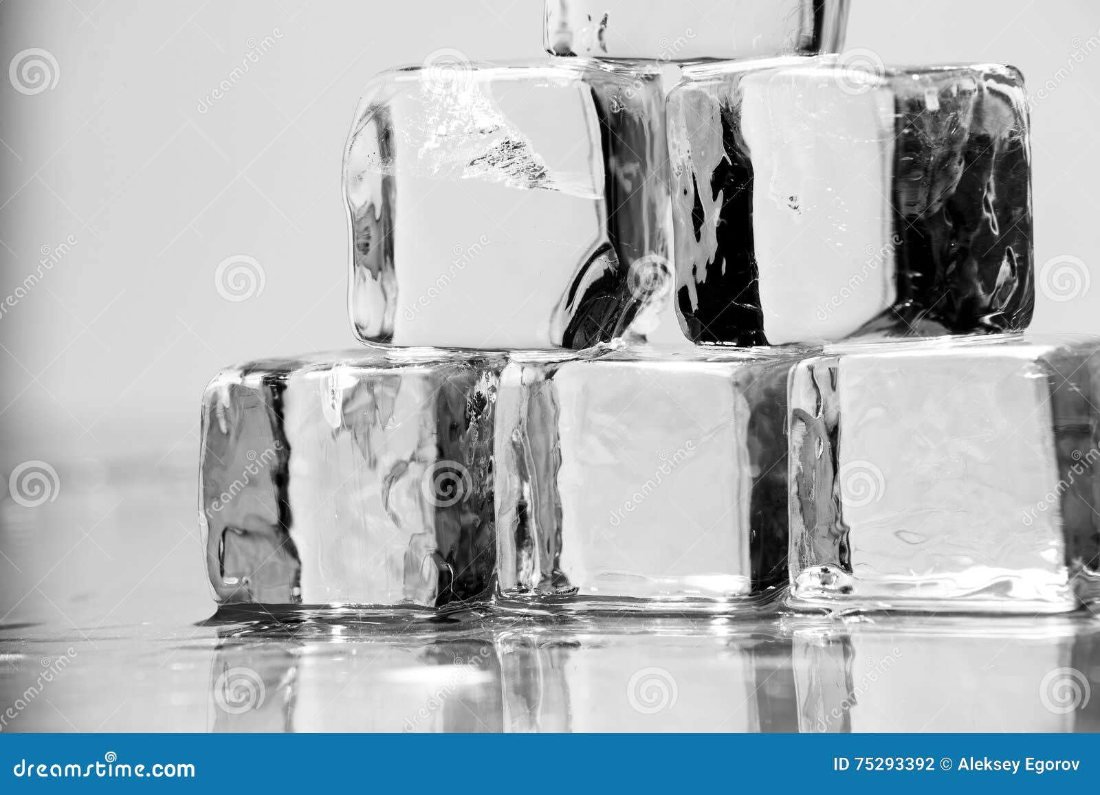 Ice cube on table stock photo. Image of melting, liquid - 75293392