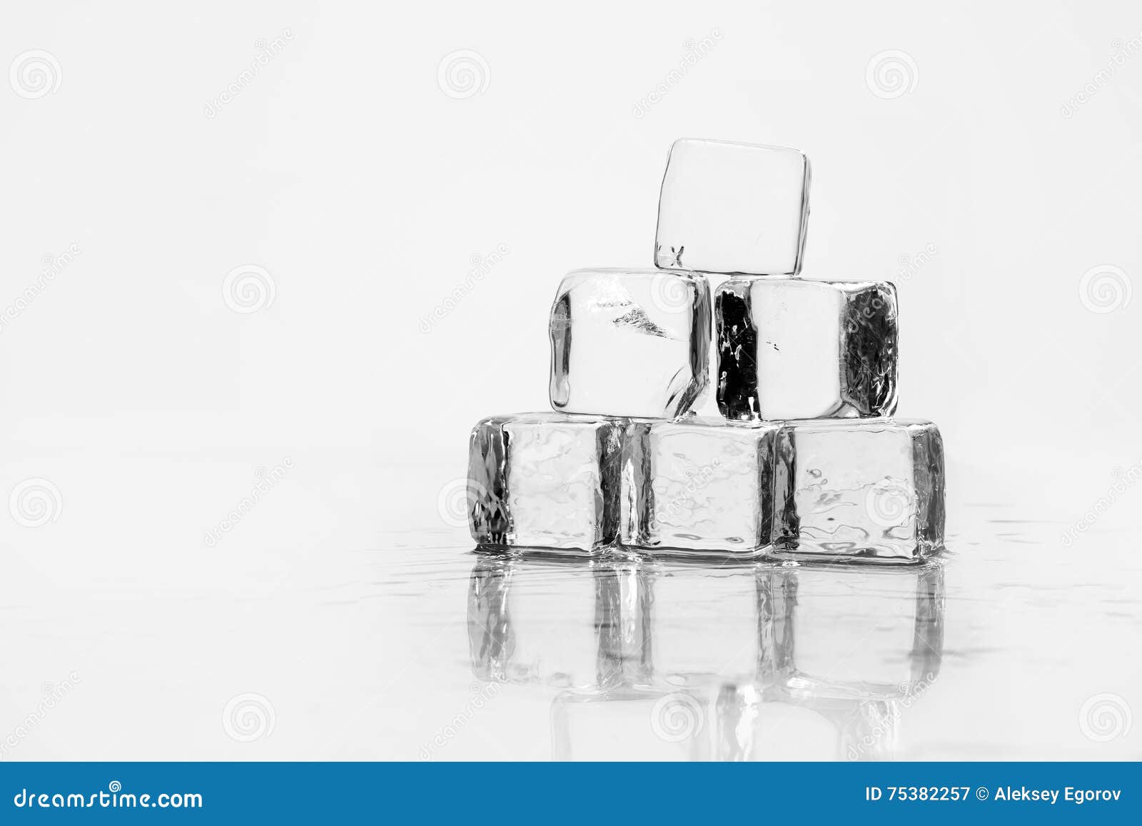 Ice cube on table stock image. Image of closeup, water - 75382257