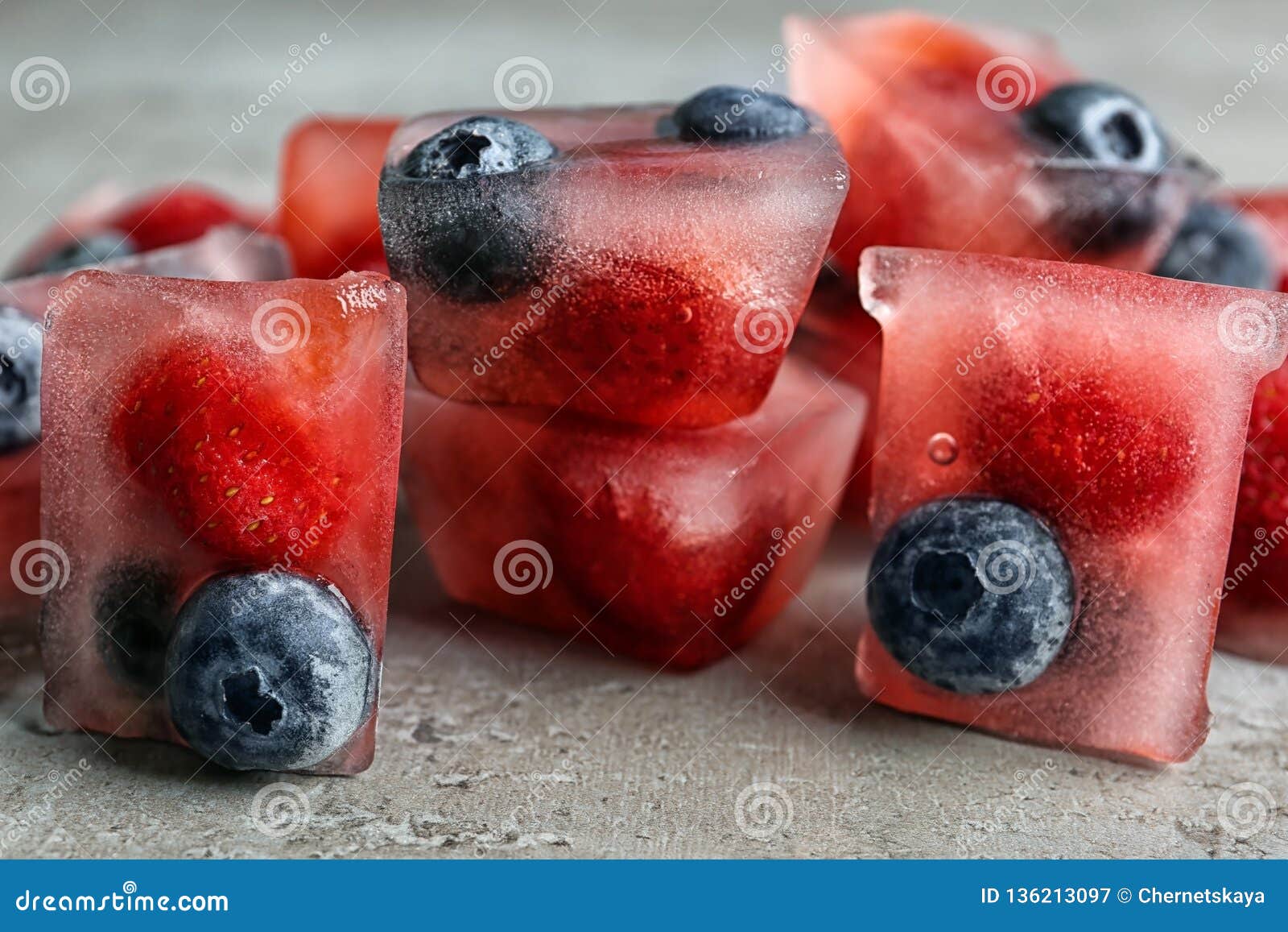 Ice cubes with berries stock image. Image of table, recipe - 136213097