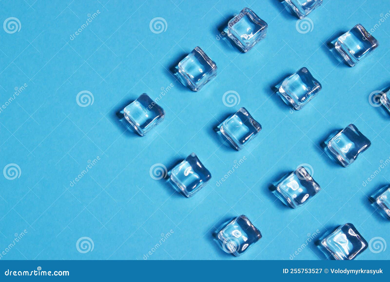 Ice cubes on blue stock image. Image of cube, blue, closeup - 255753527